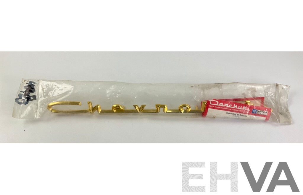 Danchuk 1957 Gold Chevrolet Badge - Lot 1568163 | EHVA